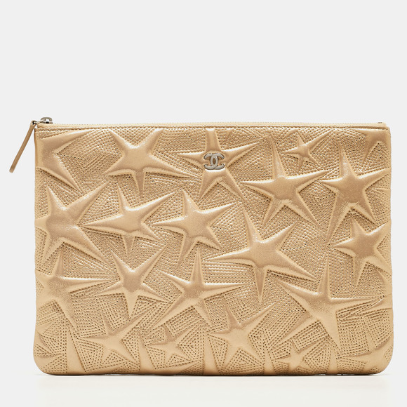 CHANEL | Bags | Chanel Gold Star Embossed Leather O Case Medium Quilted ...